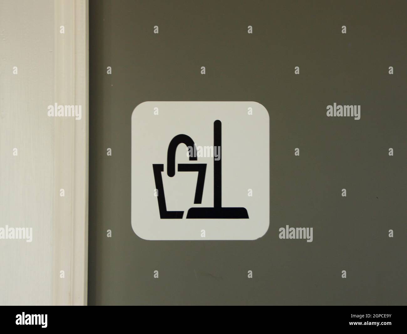 Closeup Cleaning Icon on Entrance Door to Closet. Simple Icon with ...