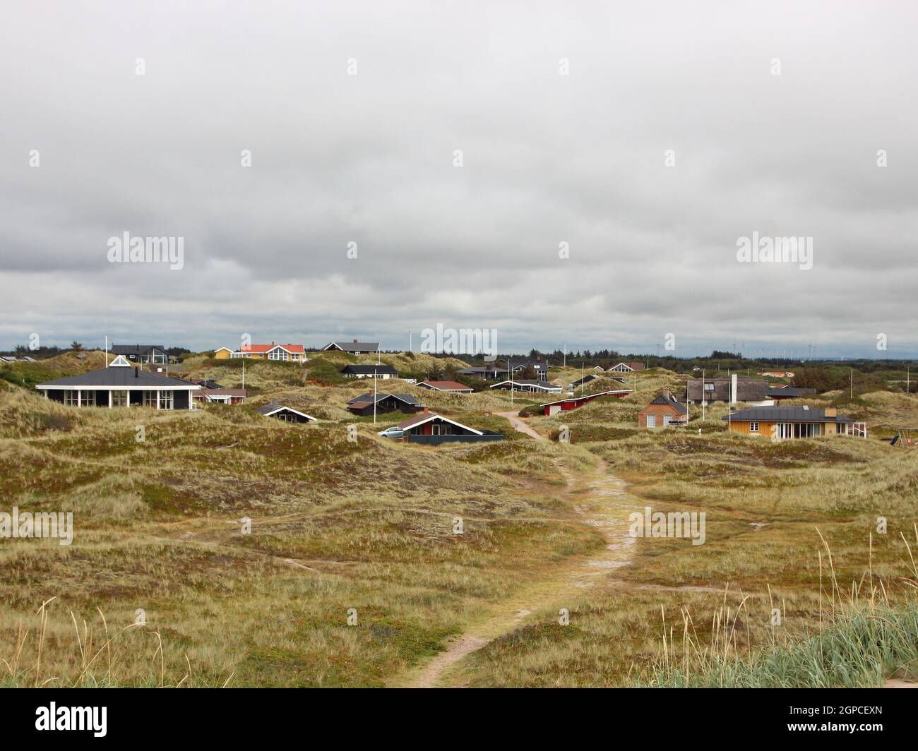 Summer Houses protected by hills at West Coast in Denmark Stock Photo ...