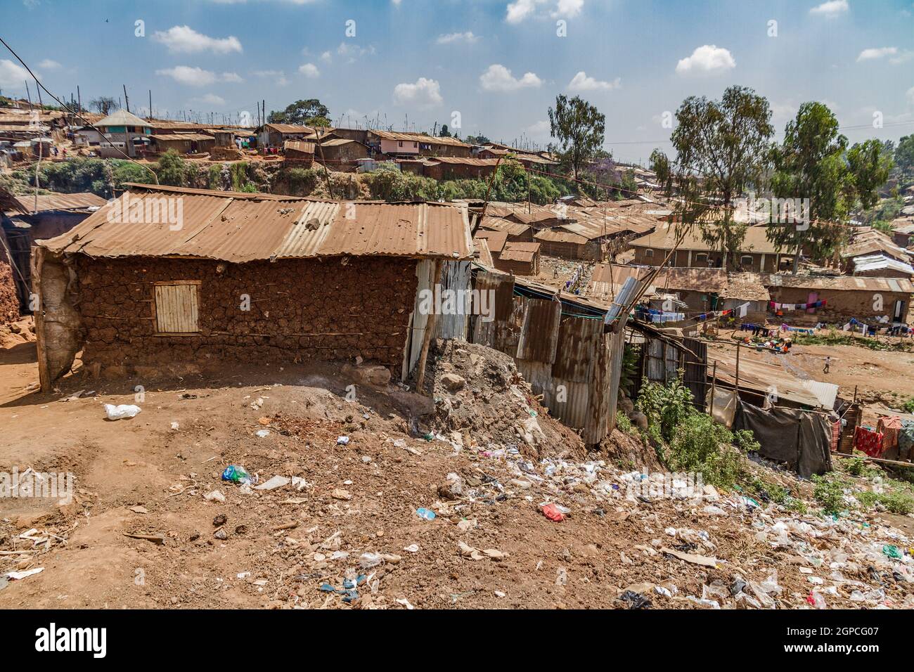A home in the slum of Kibera surrounded by trash and other homes Stock ...