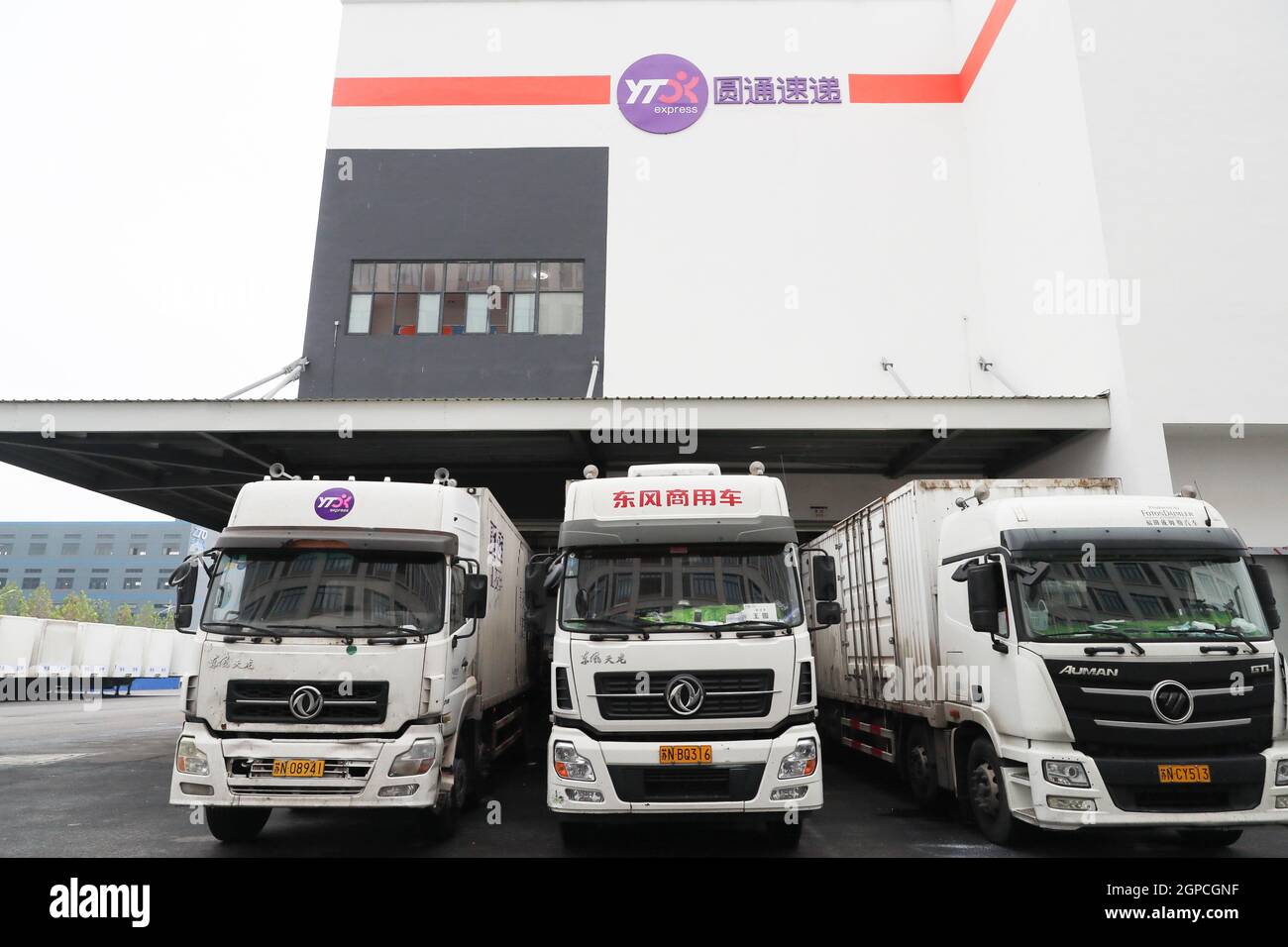 HUAI'AN, CHINA - SEPTEMBER 29, 2021 - Yto Express vehicles are seen in Huai 'an city, Jiangsu ...