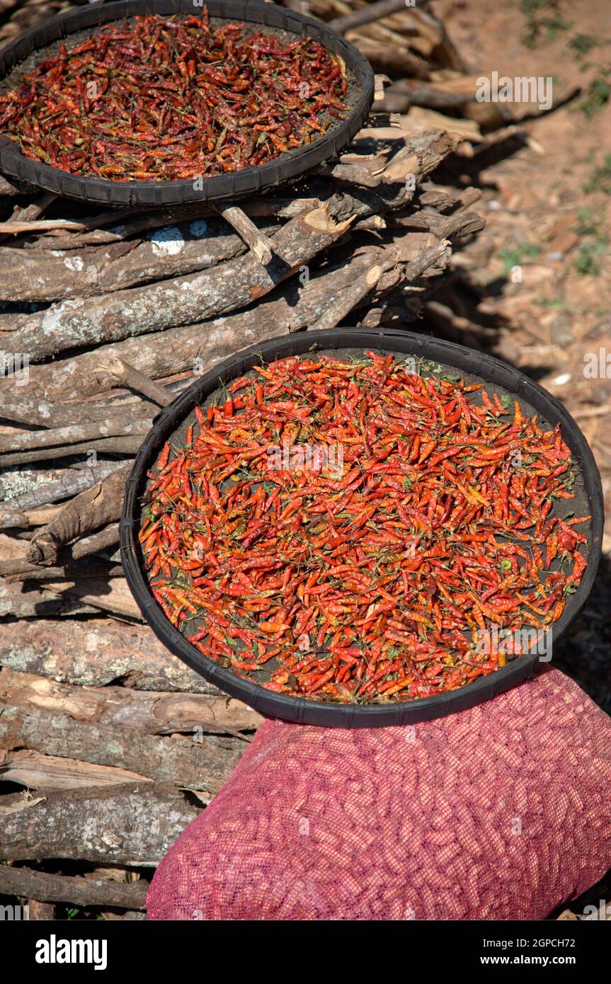 Chili peppers drying in sun hi-res stock photography and images - Alamy