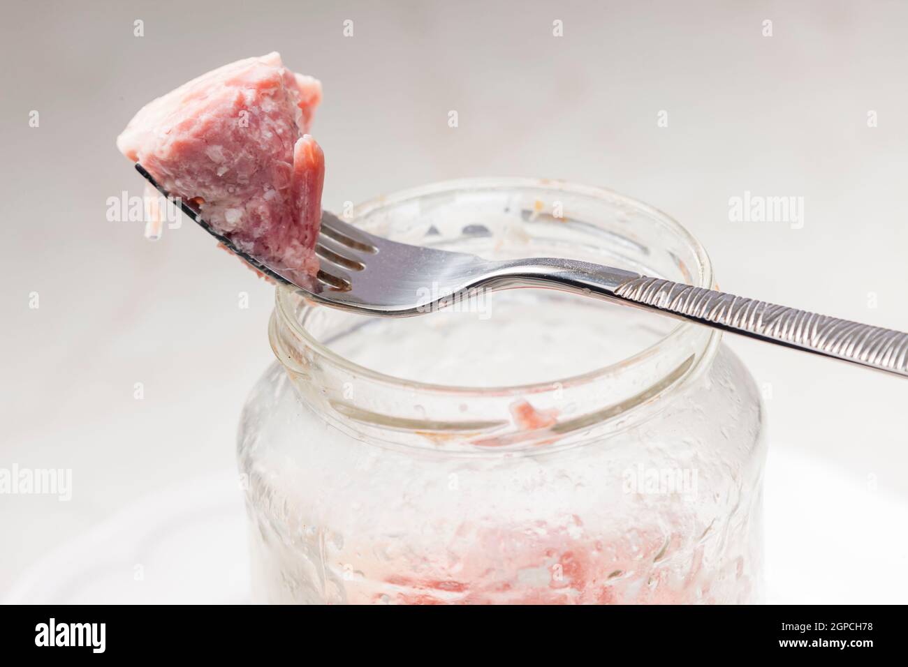 cooked pork meat in the glass jar Stock Photo - Alamy
