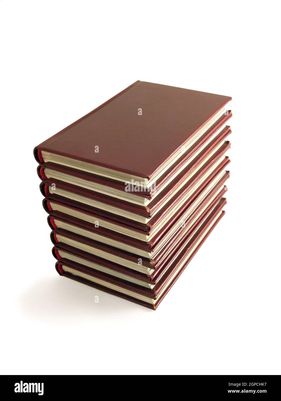 stack of books isolated on white background Stock Photo - Alamy