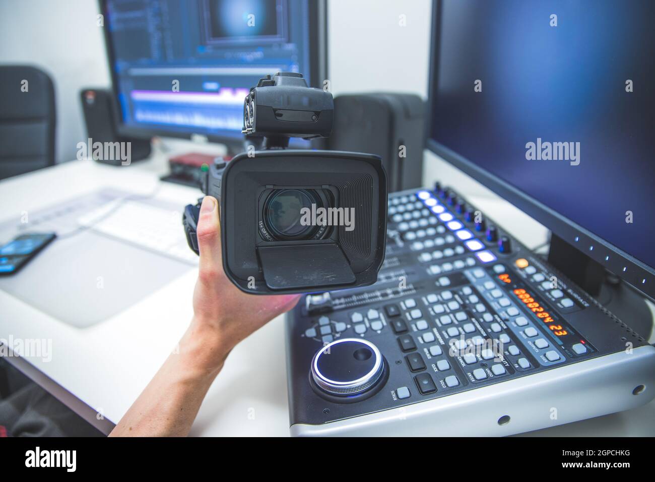 Video editing, recording and cutting room with monitors, camera and ...