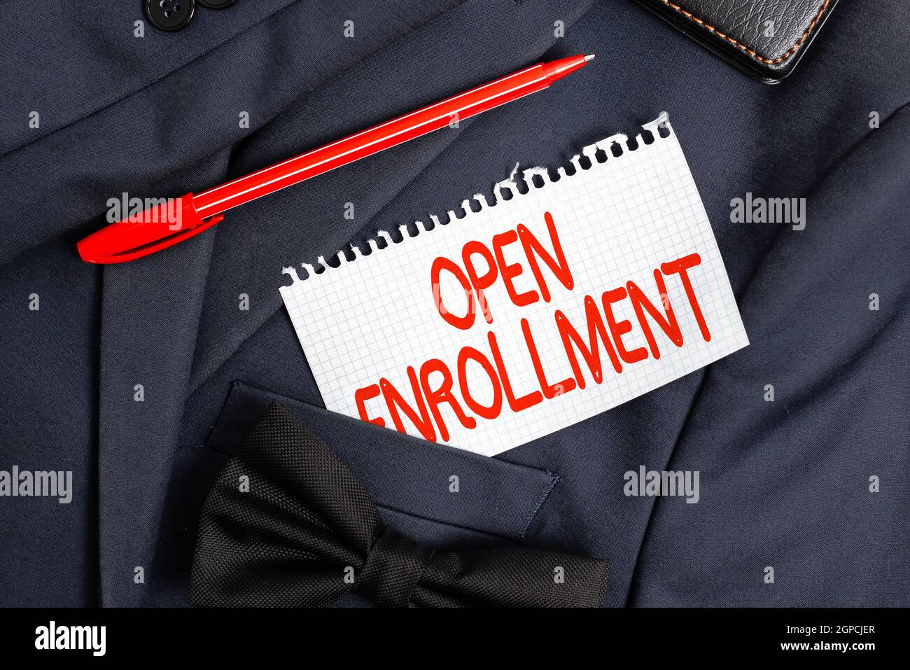 Hand writing sign Open Enrollment. Business concept The yearly period ...