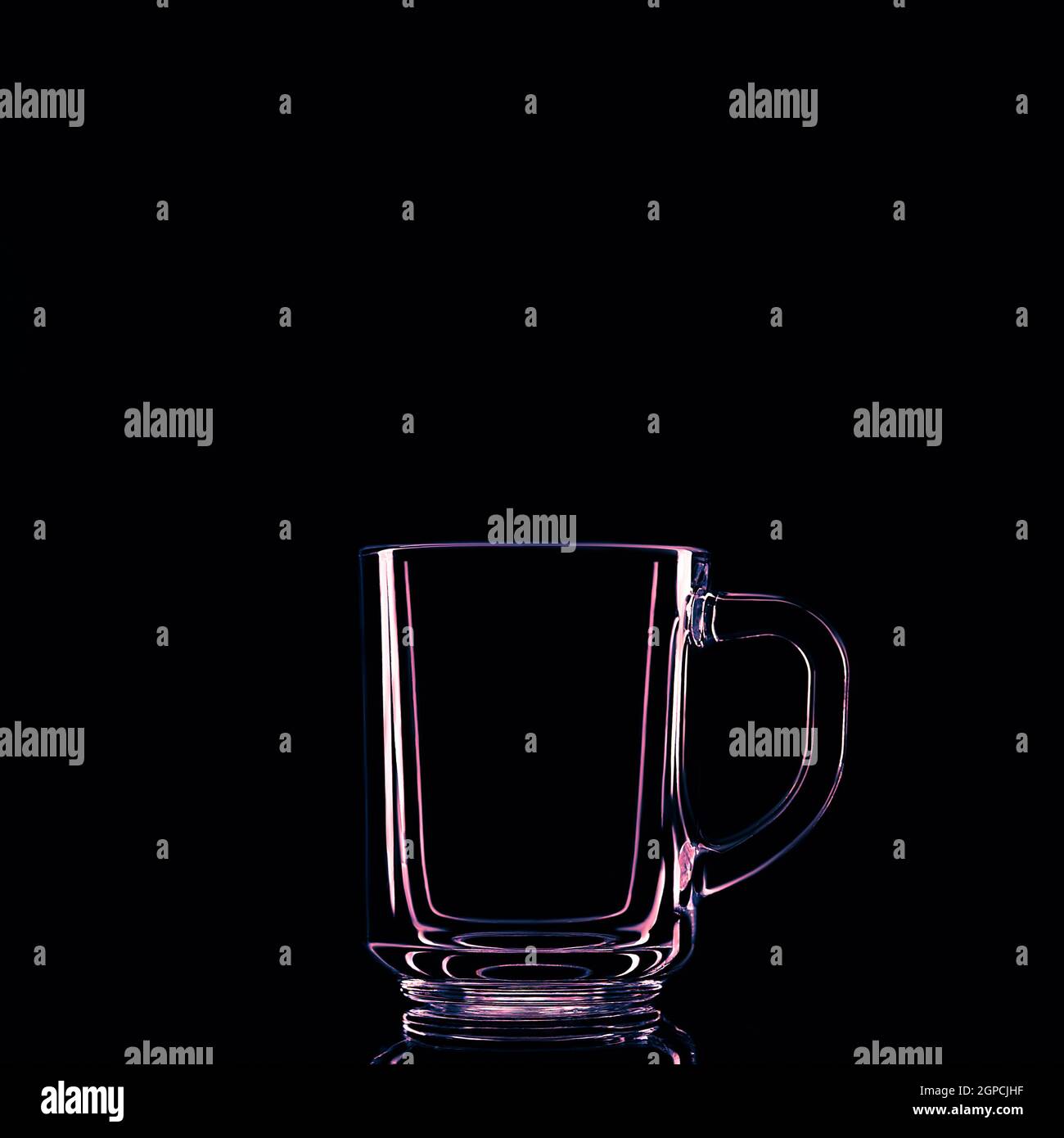 Just a glass on a black background with a reflection. Isolated Stock ...
