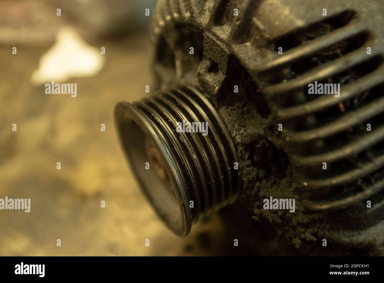 Old worn alternator of the car to be replaced Stock Photo - Alamy