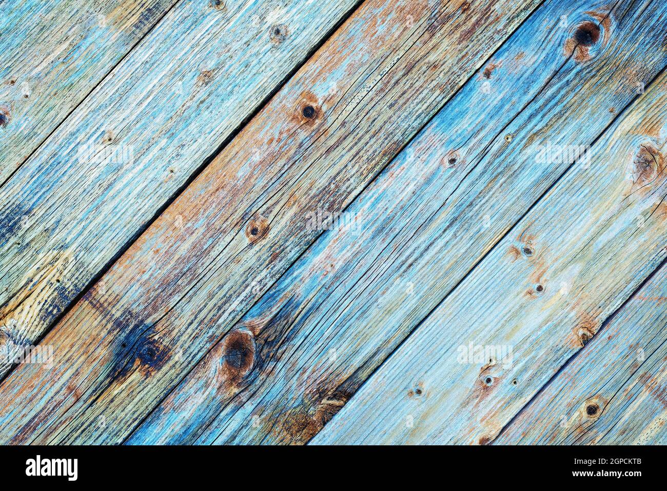 Texture of the planks of an old wooden table in antiqued pastel colors ...
