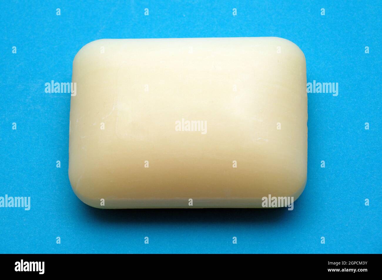 Antibacterial moisturising hand soap bar isolated on blue background ...