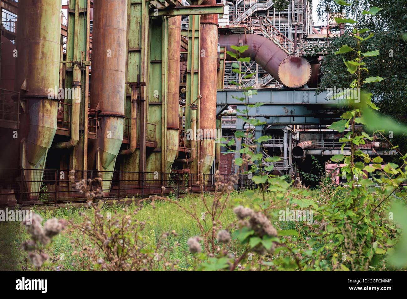 Old and abandoned factory with rustic metal structures Stock Photo - Alamy