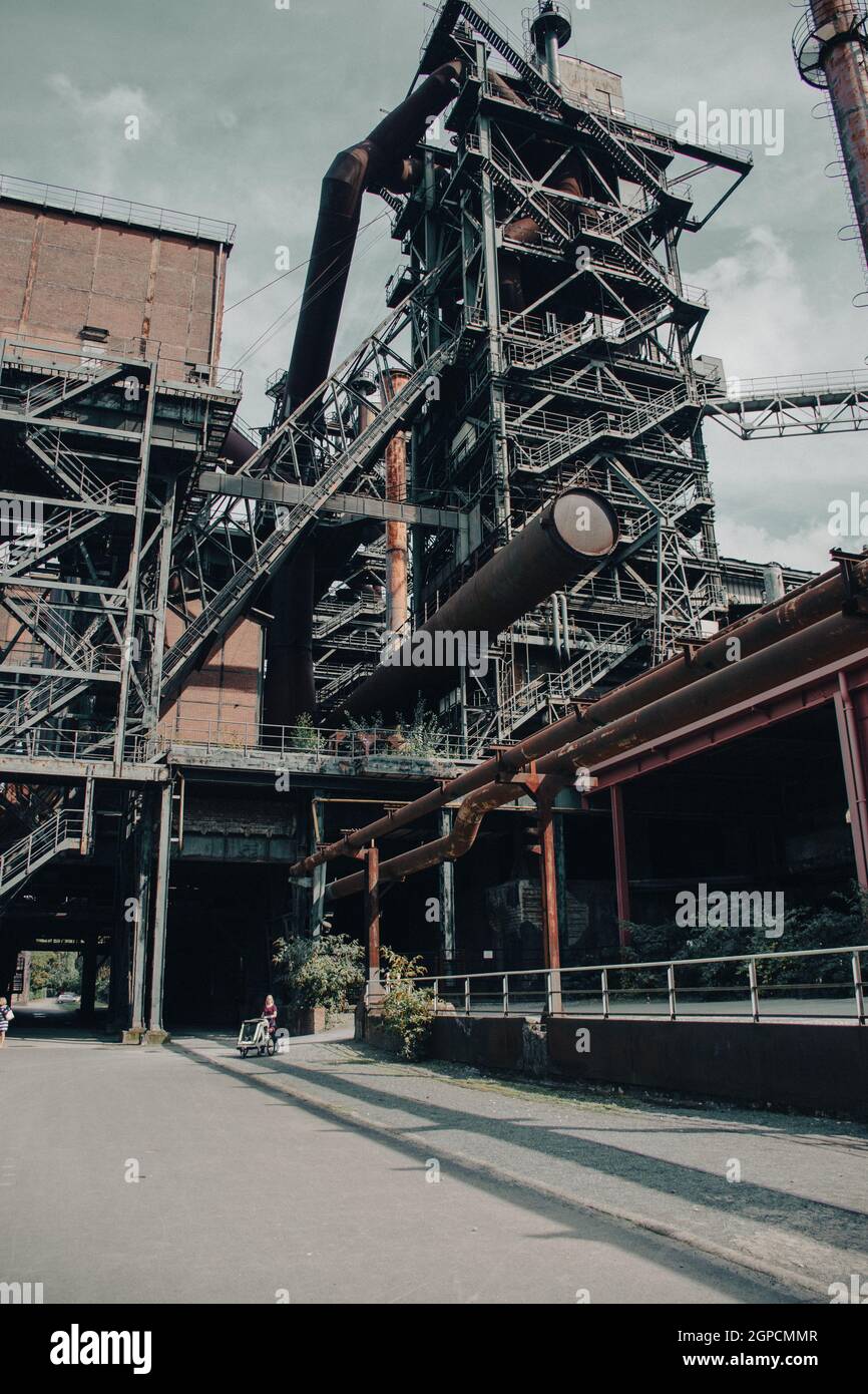 Old and abandoned factory with rustic metal structures Stock Photo - Alamy