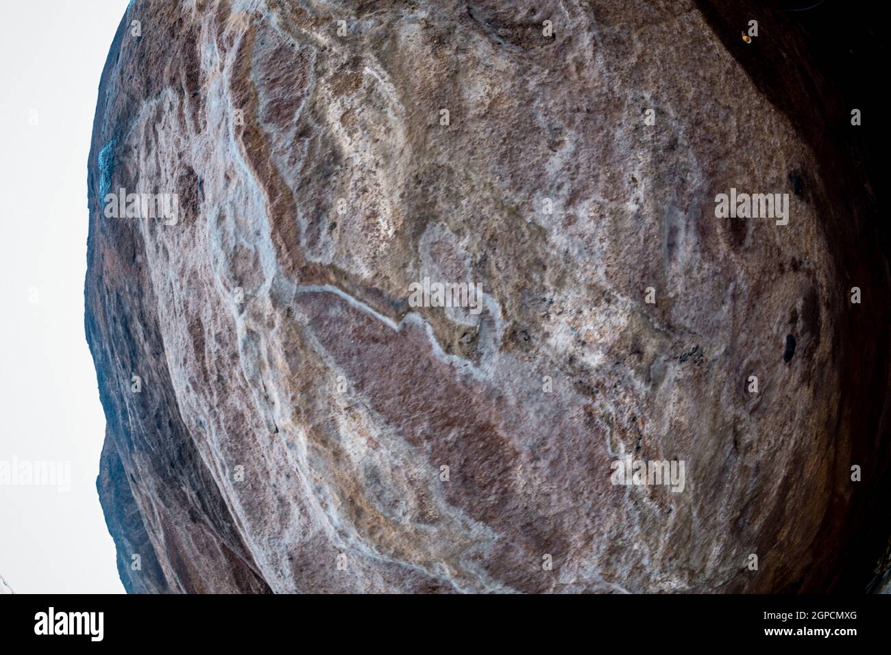 Natural background. Closeup edged shabby cliff cracks. Gray-brown stone ...