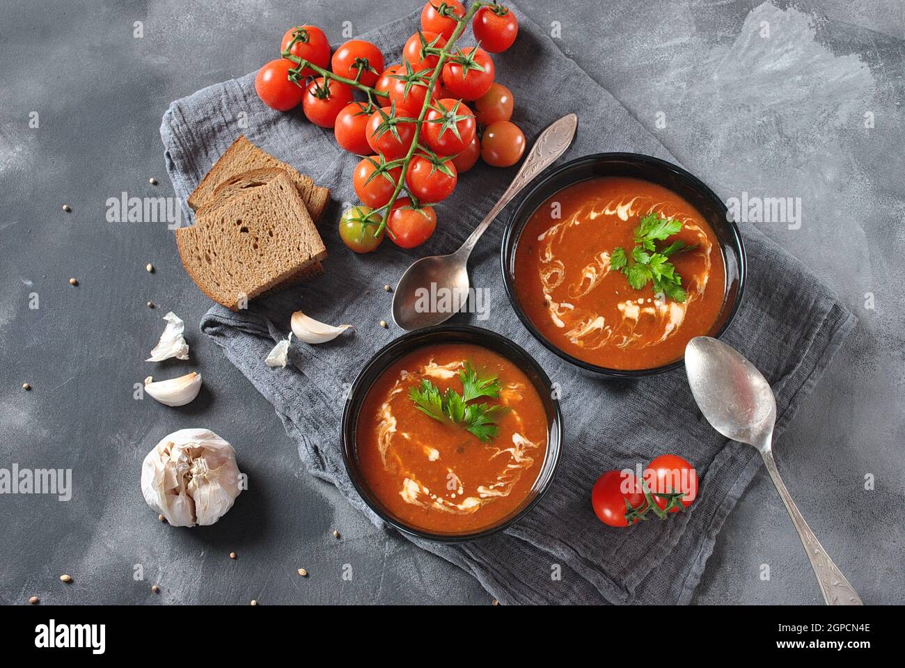 Hot winter soup. Red hot tomato soup with garlic, sweet paprika ...