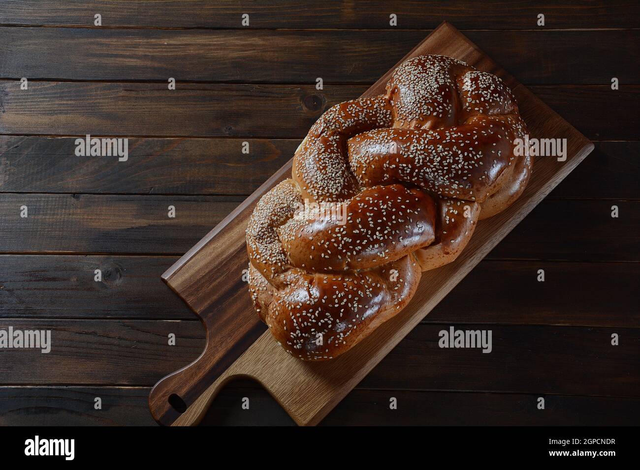 Homemade challah bread with sesame seeds. Jewish traditional bread for ...