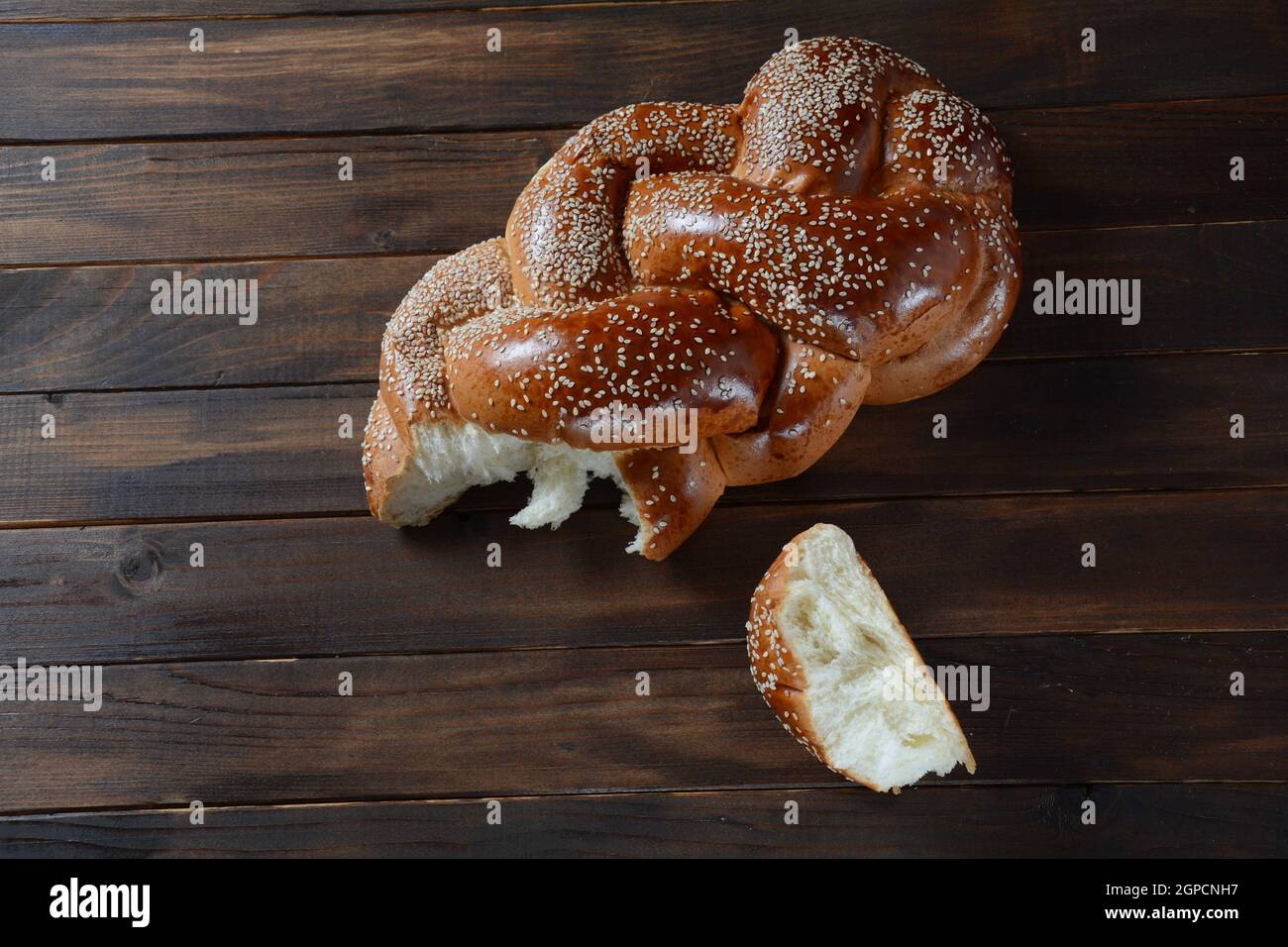 Homemade challah bread with sesame seeds. Jewish traditional bread for ...