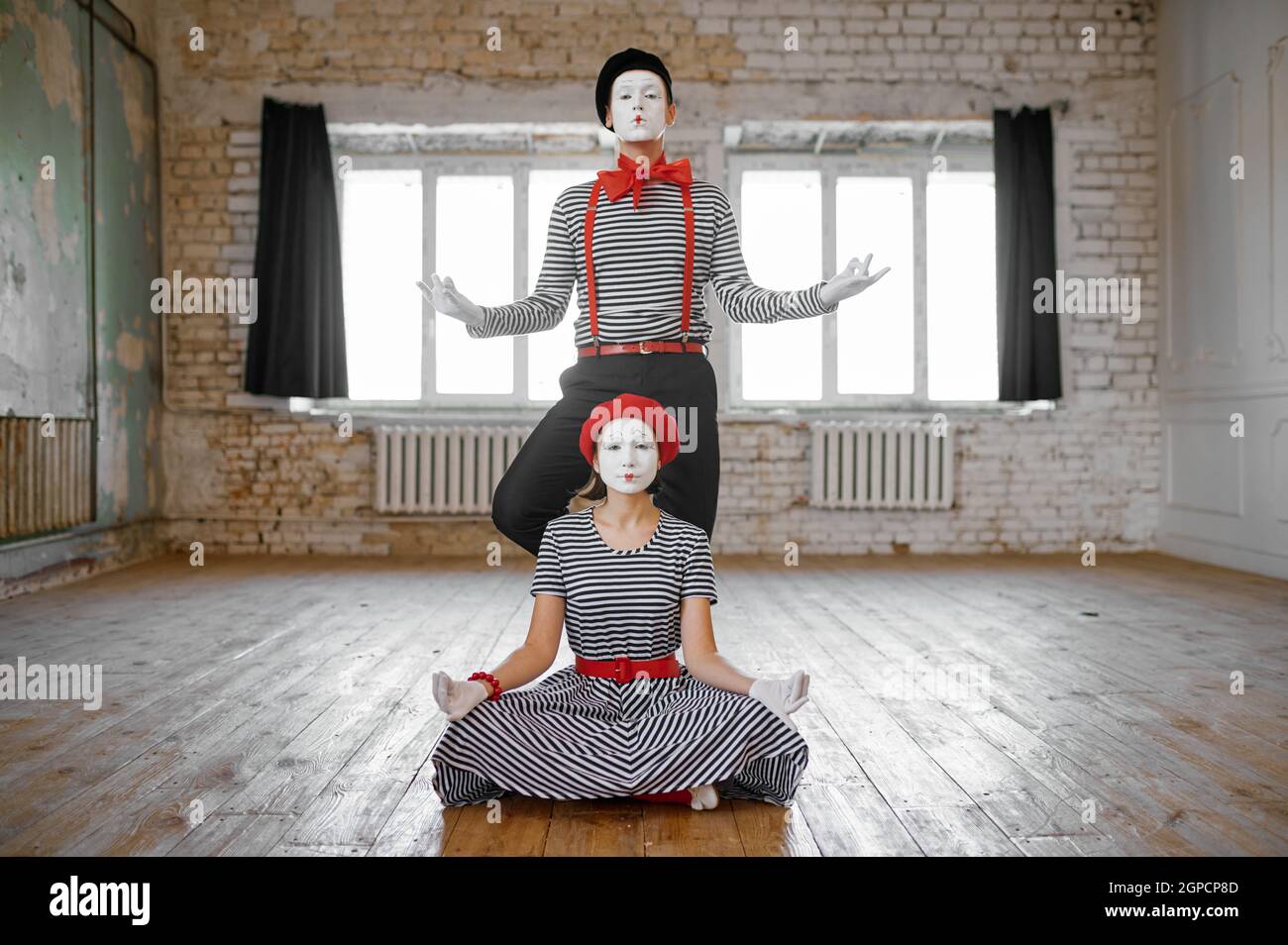 Two mime artists, love couple parody scene, comedy. Pantomime theater ...
