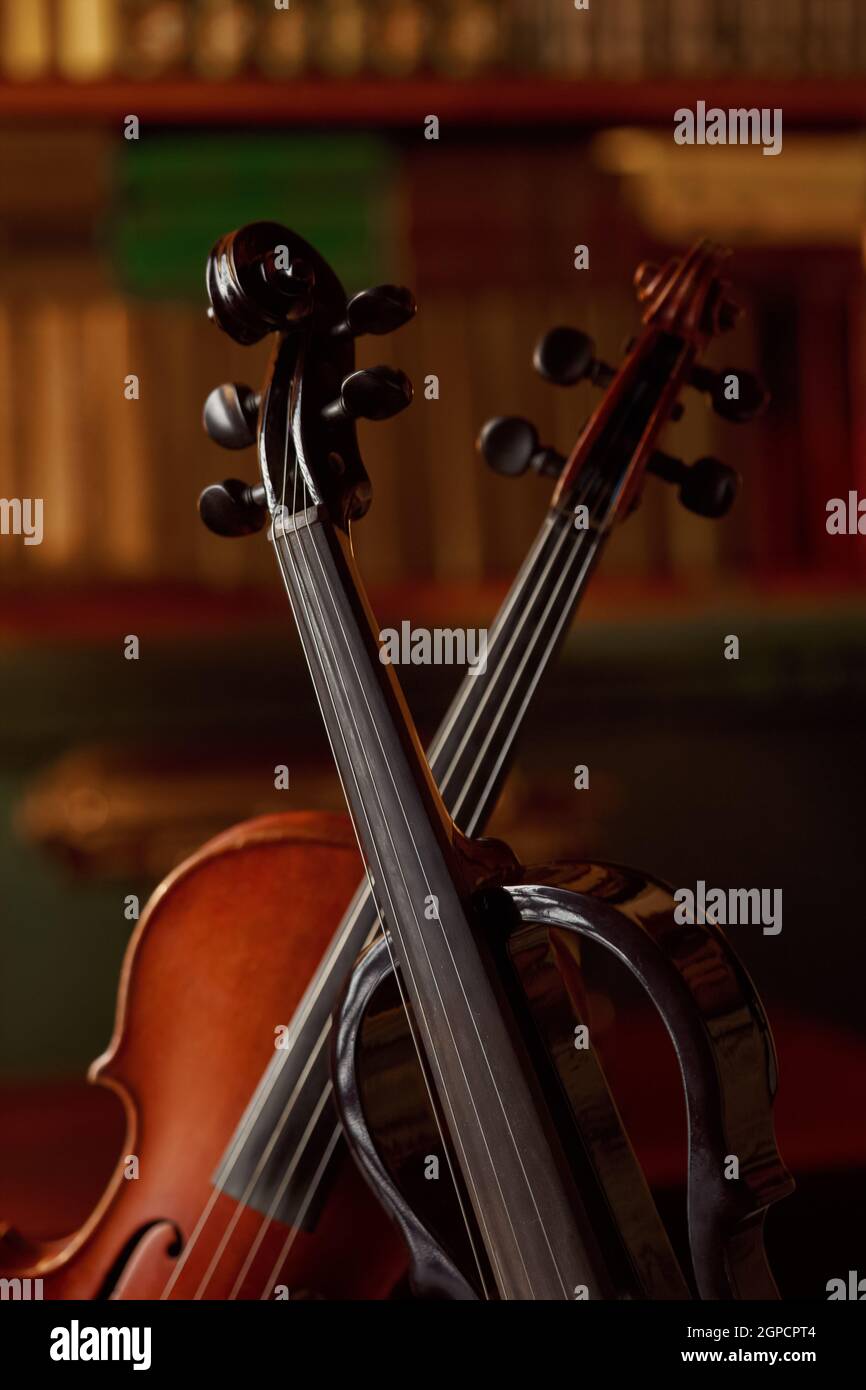 Violin in retro style and modern electric viola, closeup view, nobody ...