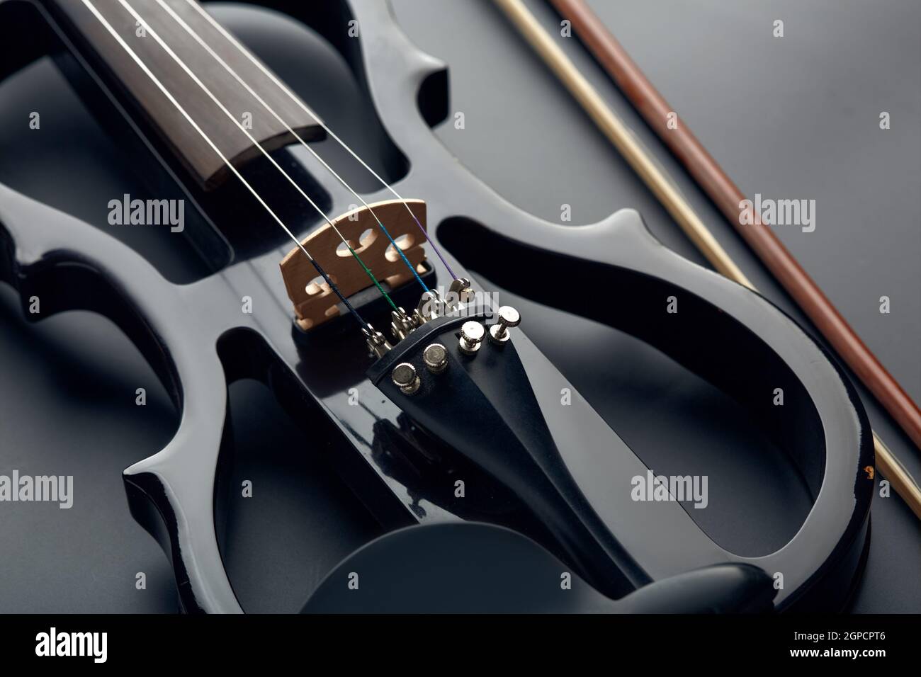 Modern electric violin and bow, closeup view, nobody. Classical string ...
