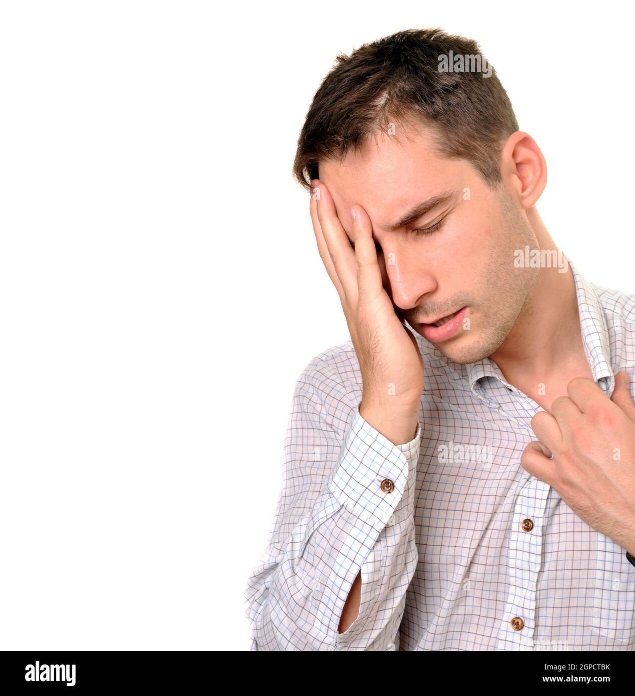 young businessman under stress isolated over white Stock Photo - Alamy