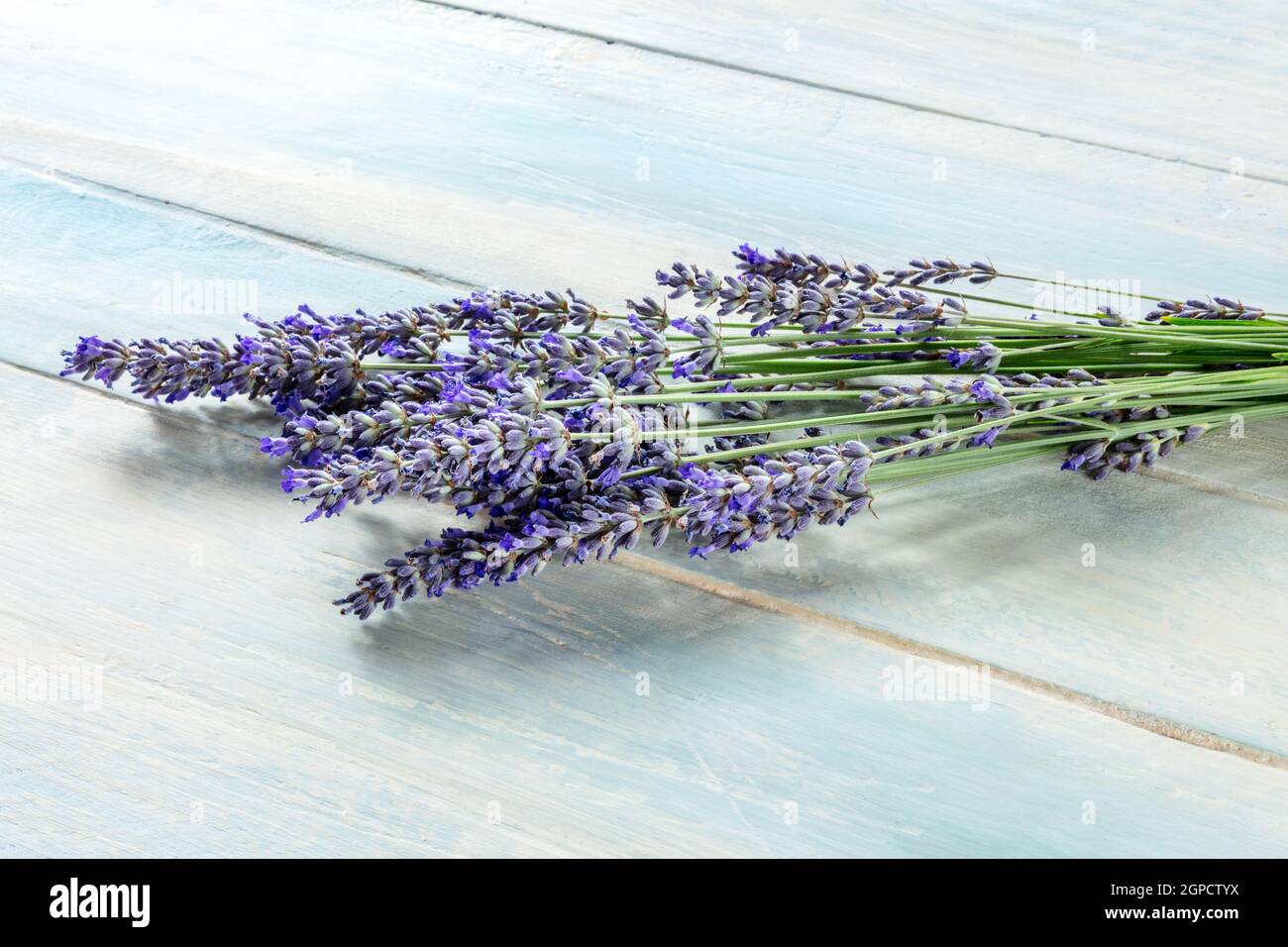 Lavender flower bouquet on a rustic wooden background, a bunch of ...