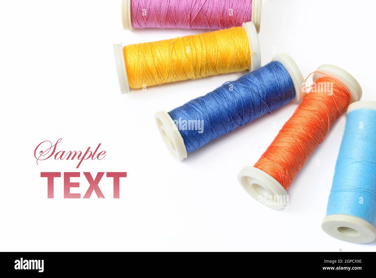 Colorful thread isolated over white Stock Photo - Alamy