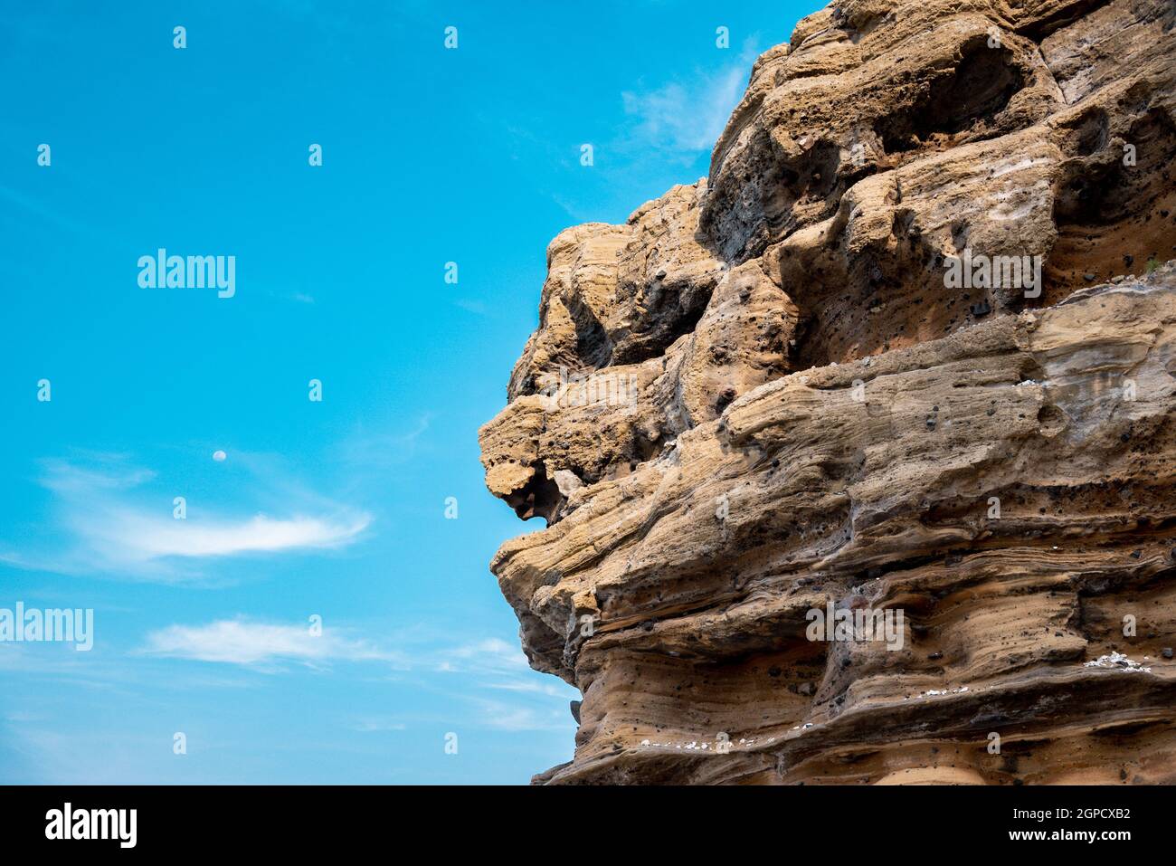 Natural background. Closeup edged shabby cliff cracks. Gray-brown stone ...