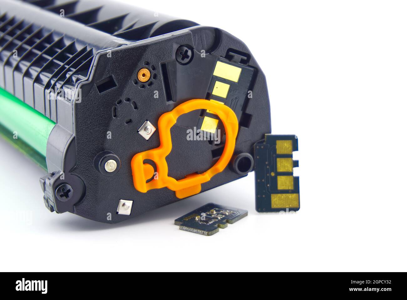 Laser printer toner cartridge and reset chip isolated on white ...