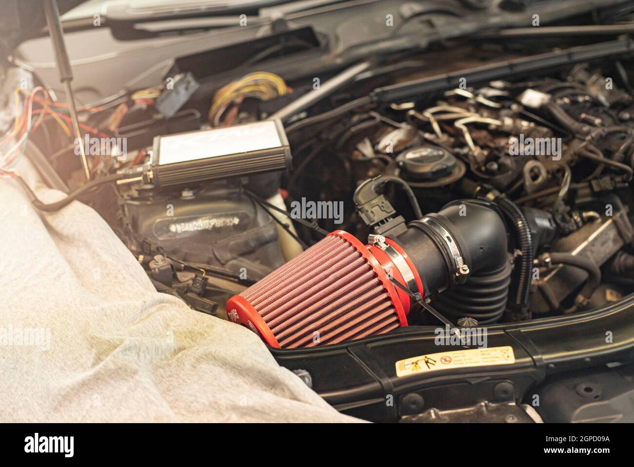 Tuning car engine detail in the workshop Stock Photo - Alamy