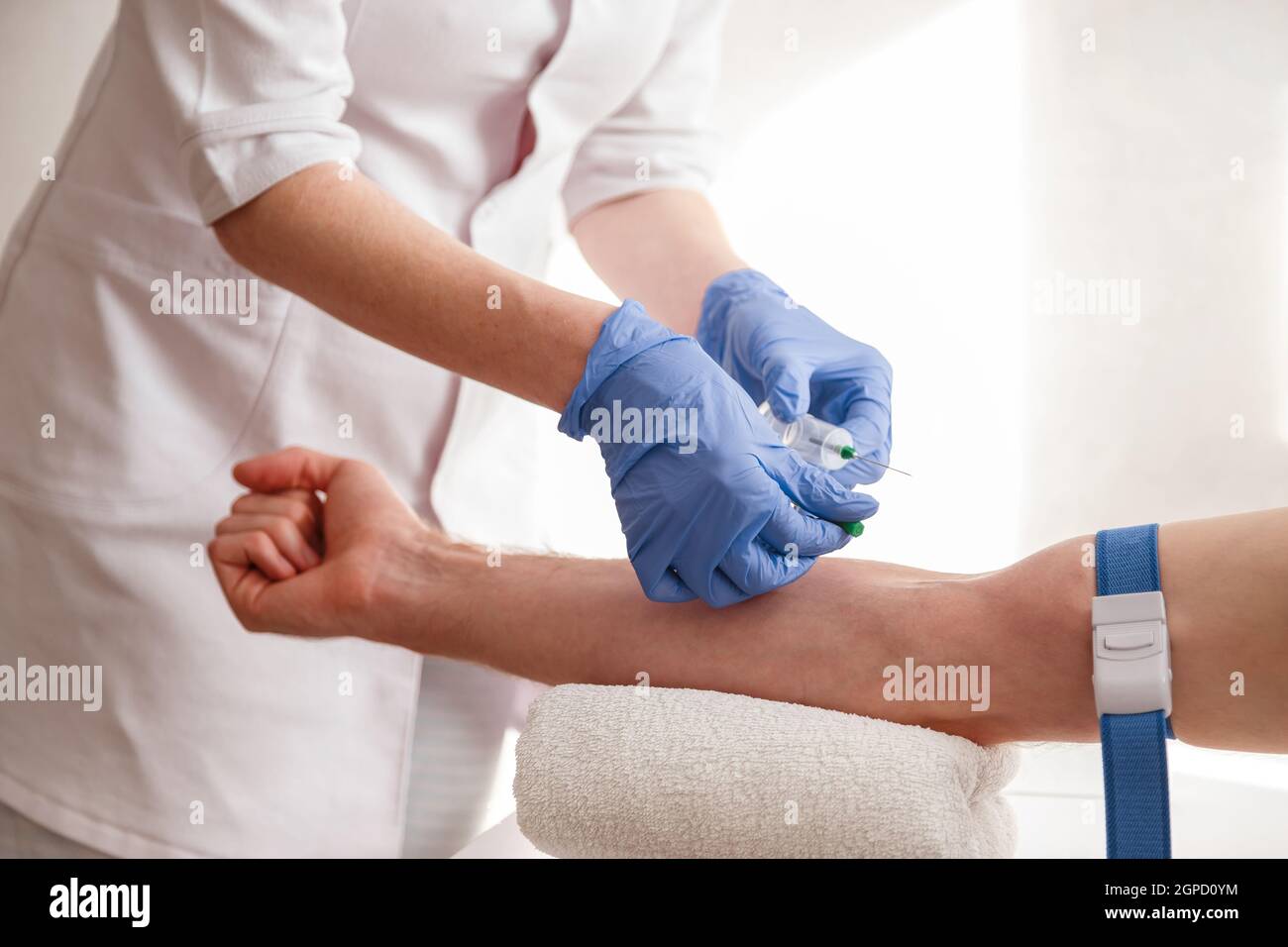 The nurse draws blood from a vein for test. Blood chemistry Stock Photo ...