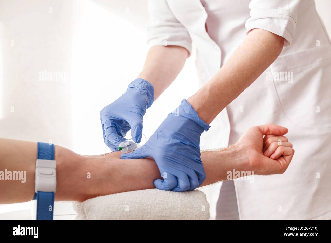 The nurse draws blood from a vein for test. Blood chemistry Stock Photo ...