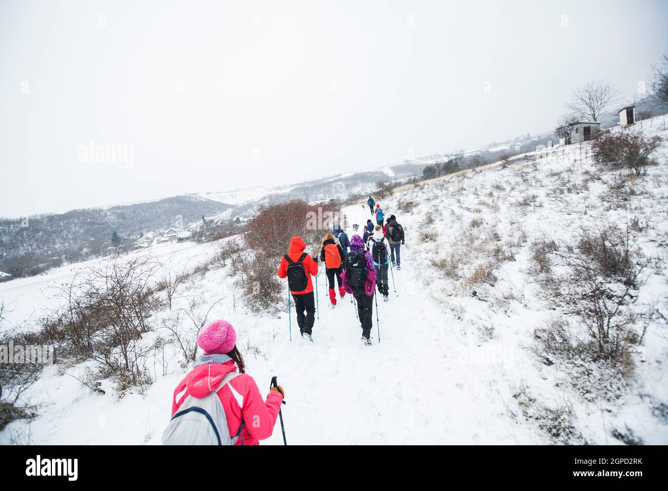 Group of hikers walking on the hike trail on snow winter day Stock ...