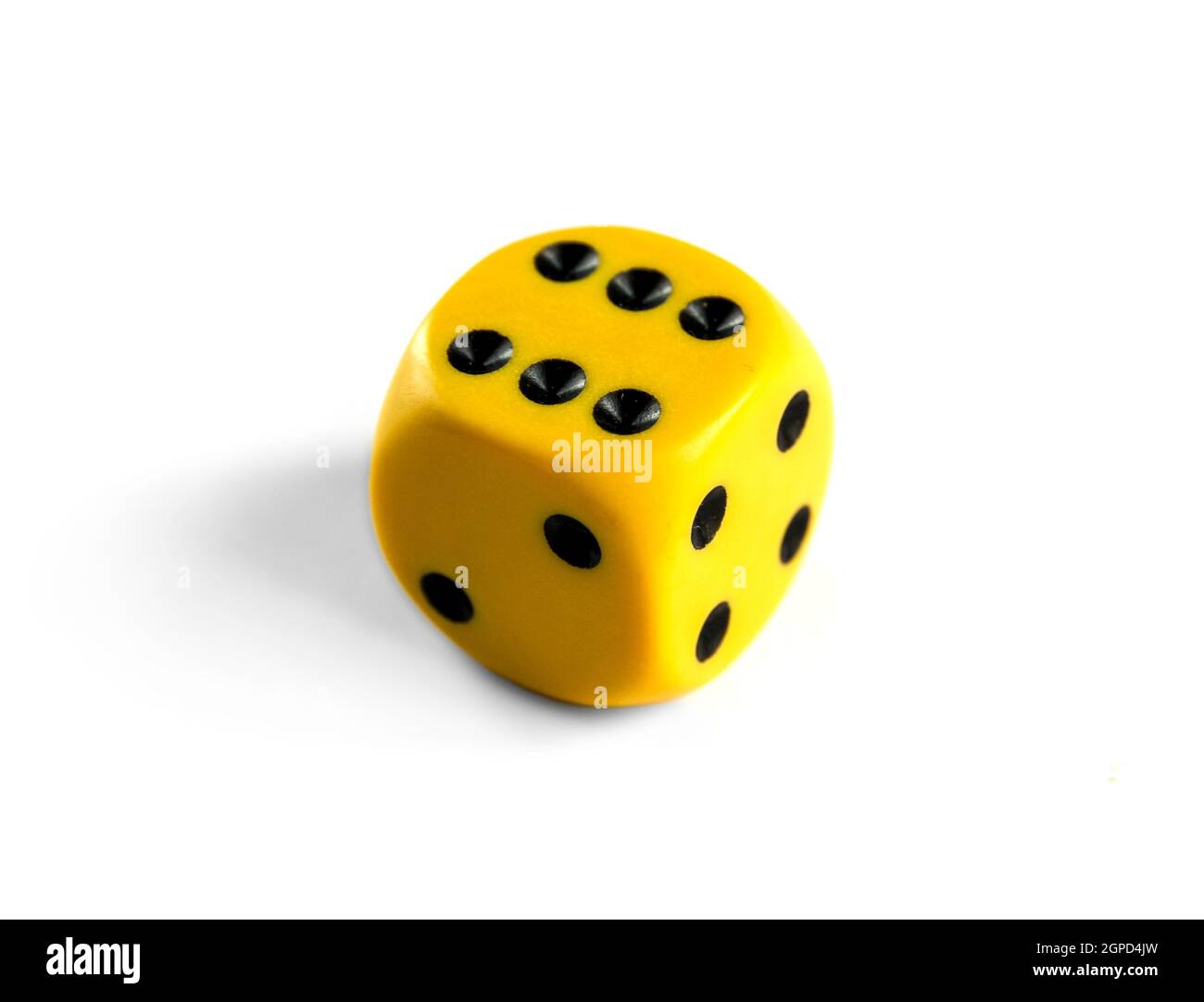 Yellow dice isolated on white background. Top view Stock Photo - Alamy