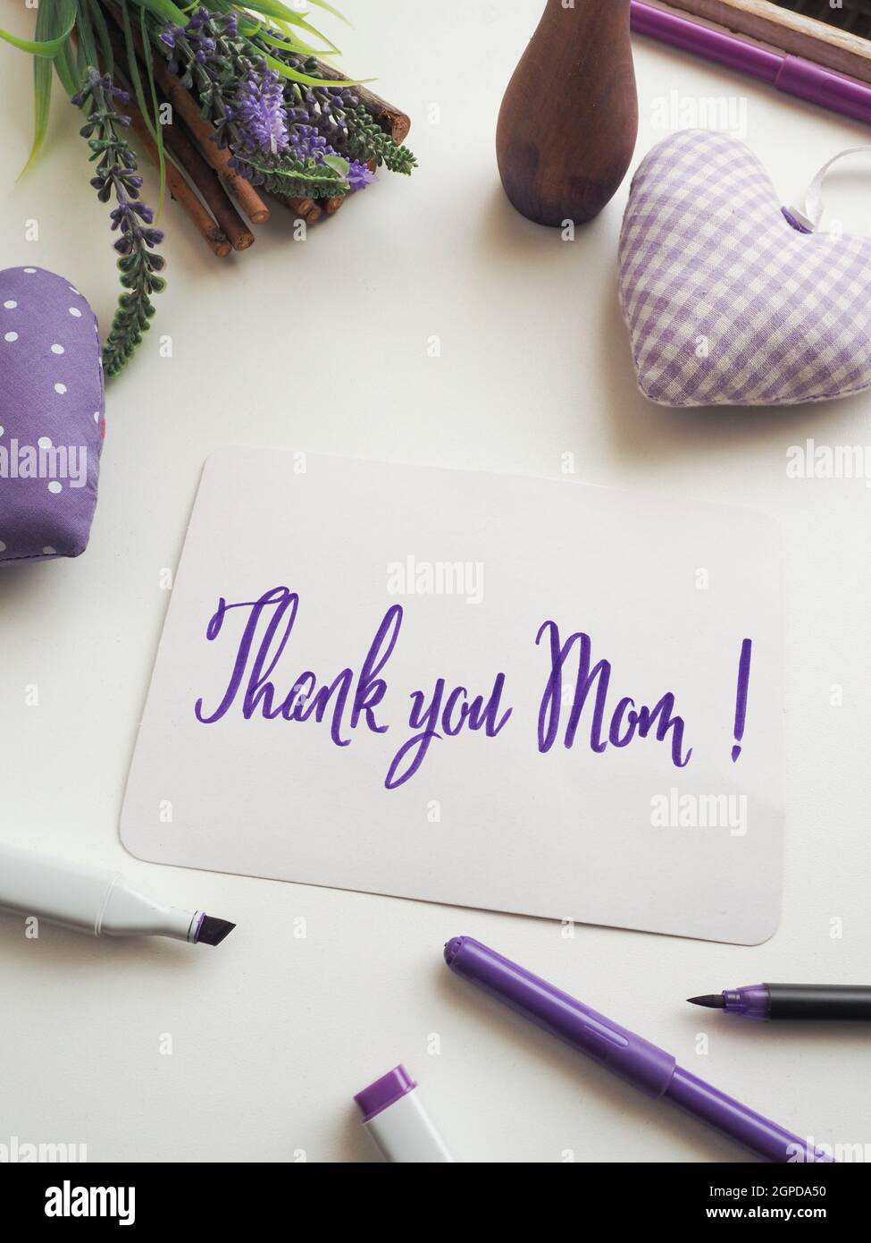 Thank you mother as brush lettering on a mothers day greeting card on a ...