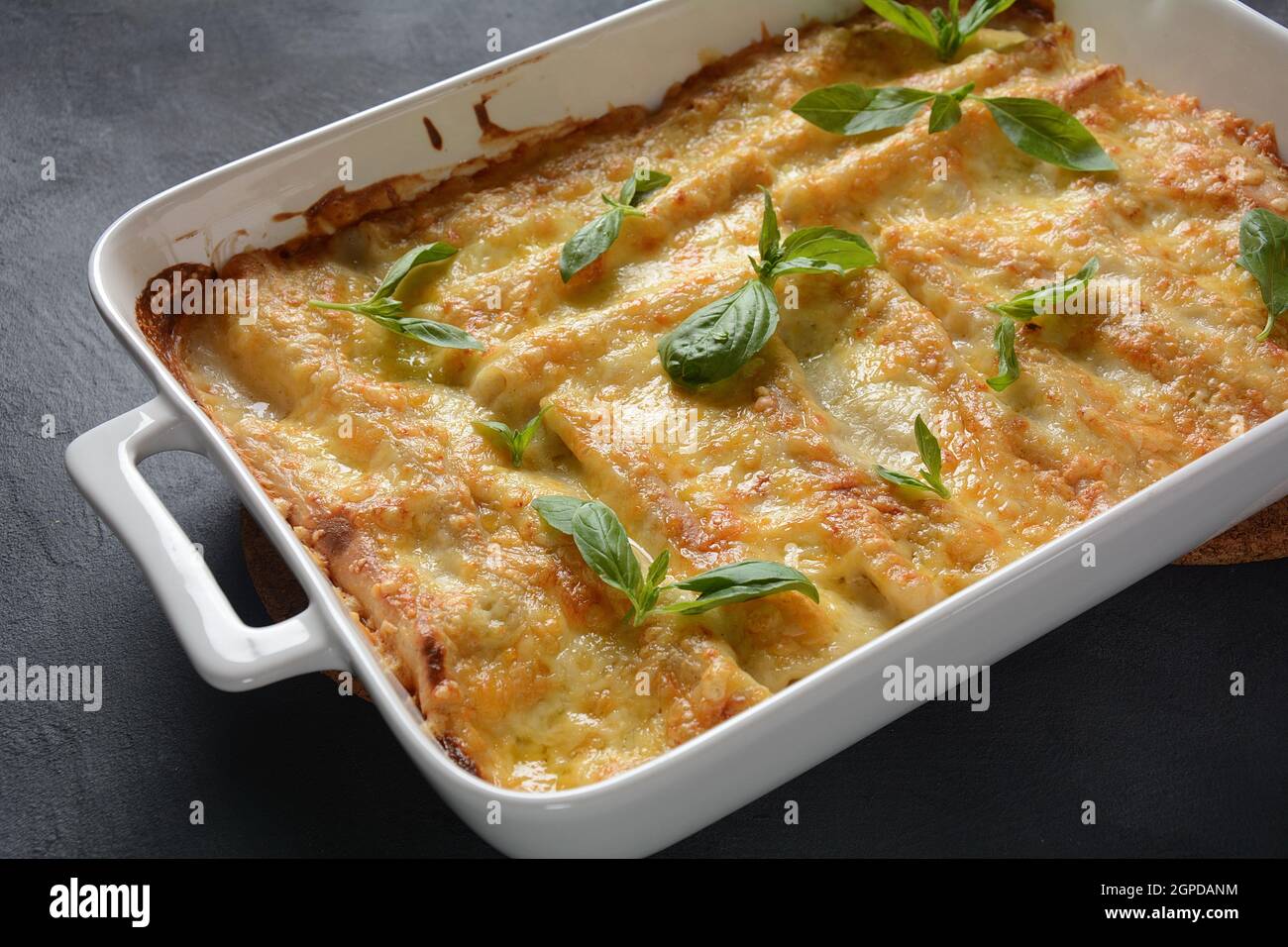 Cannelloni pasta stuffed with spinach, mushrooms,ricotta and sauce ...