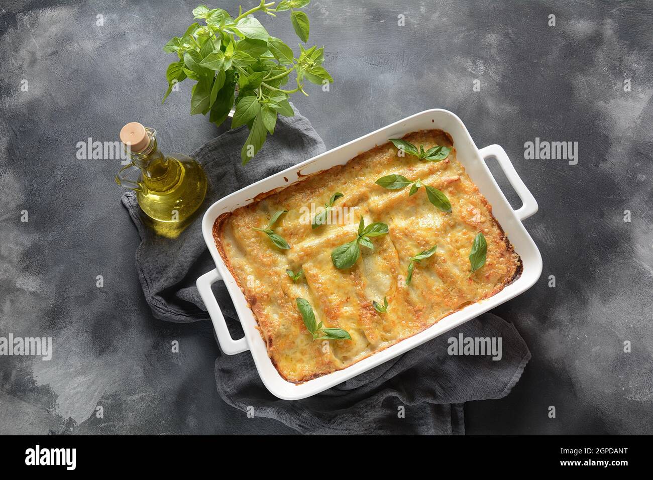 Cannelloni pasta stuffed with spinach, mushrooms,ricotta and sauce ...