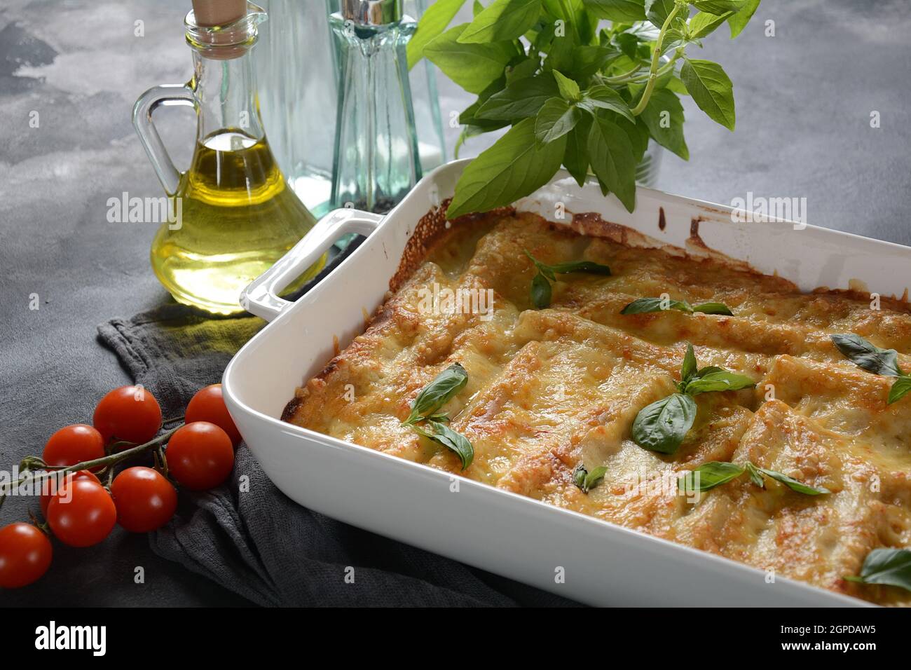 Cannelloni pasta stuffed with spinach, mushrooms,ricotta and sauce ...