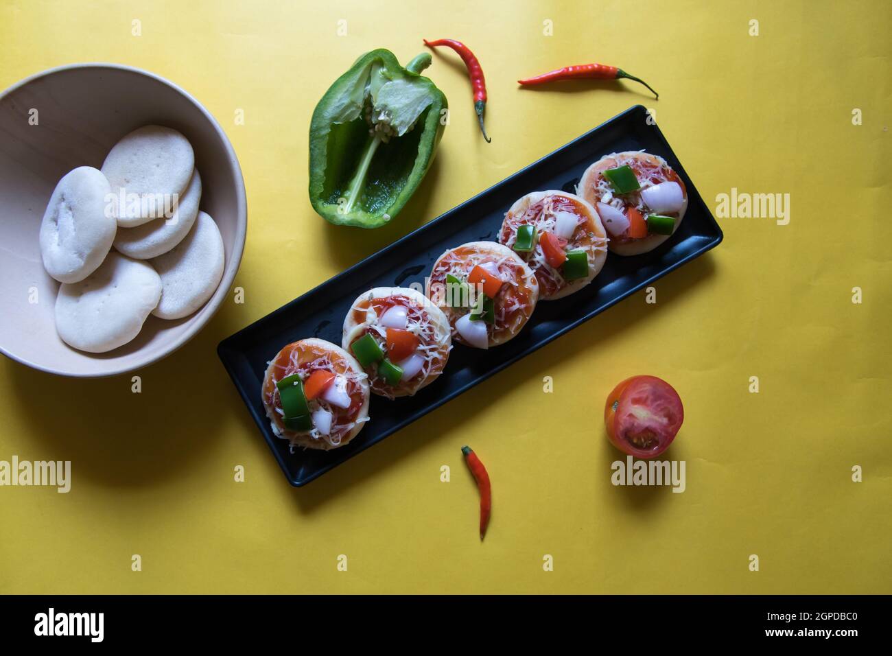 Popular Italian delicacy pizza. Ready to serve pizzas along with ...