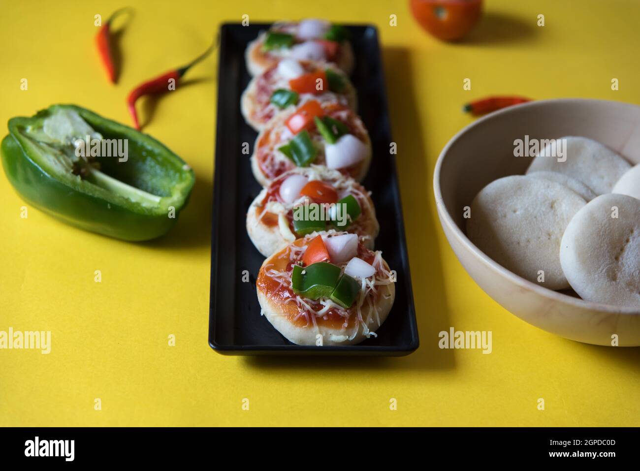 Popular Italian delicacy pizza. Ready to serve pizzas along with ...