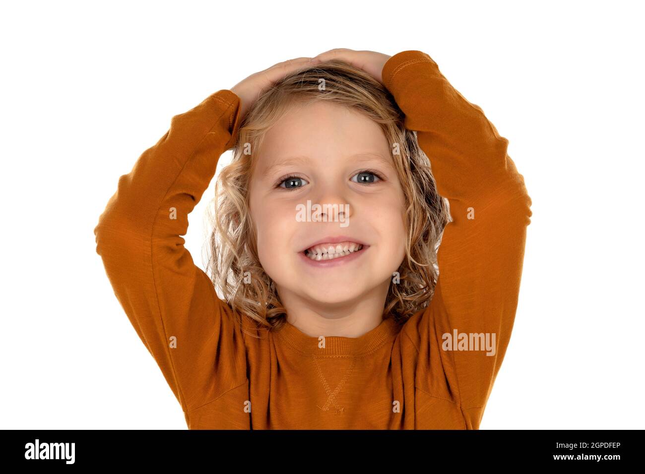 Funny surprised child with his hands on the head isolated on a white ...