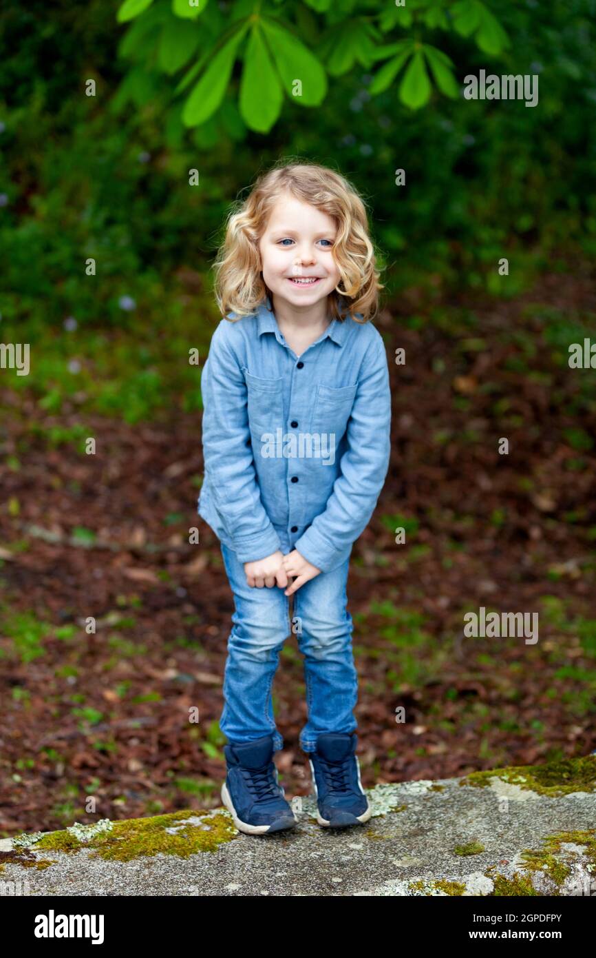 Child in the field wanting to pee Stock Photo - Alamy