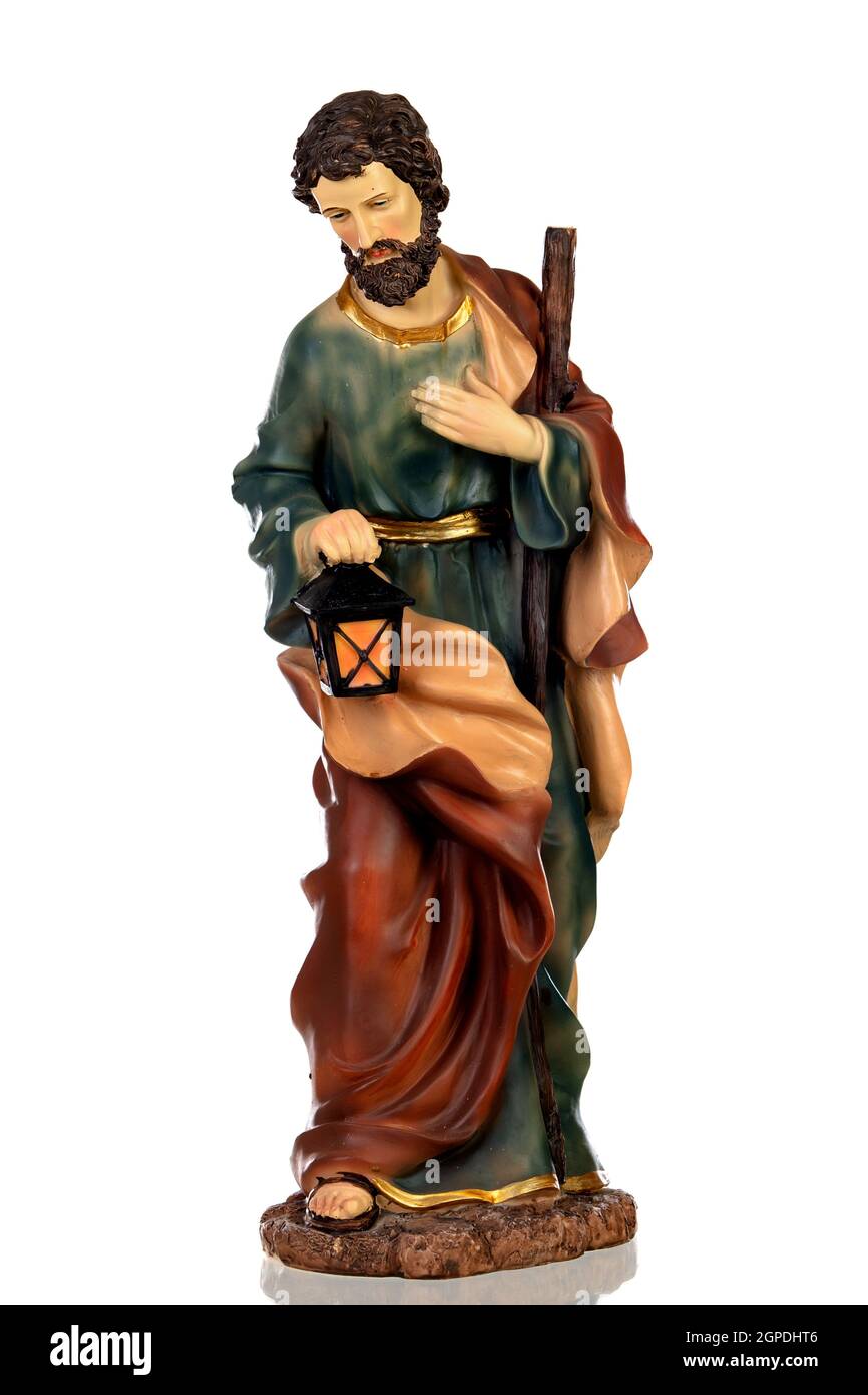Figure of Saint Joseph of the Nativity scene isoalted on a white ...