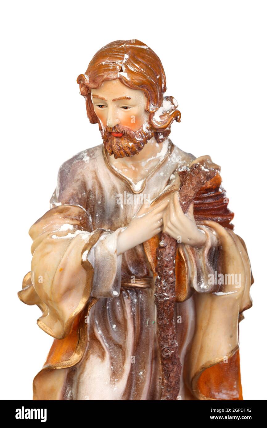 Figure of Saint Joseph of the Nativity scene isoalted on a white ...