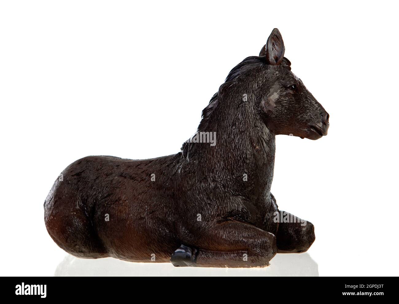 Figure of a mule for the Nativity Potal isolated on a white background ...