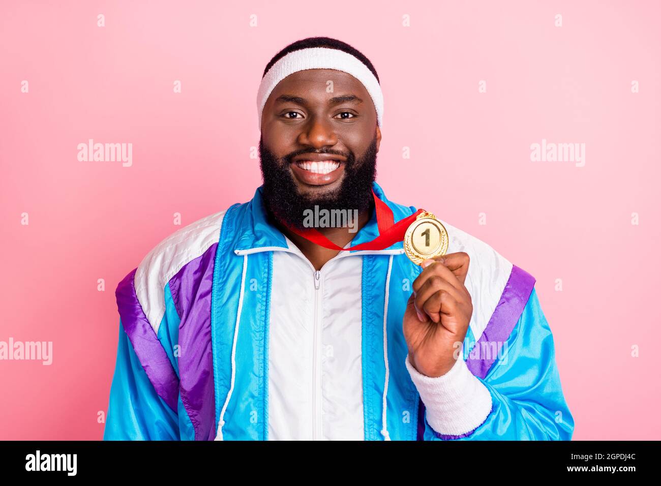 Photo of charming lucky dark skin guy dressed sport suit headband ...