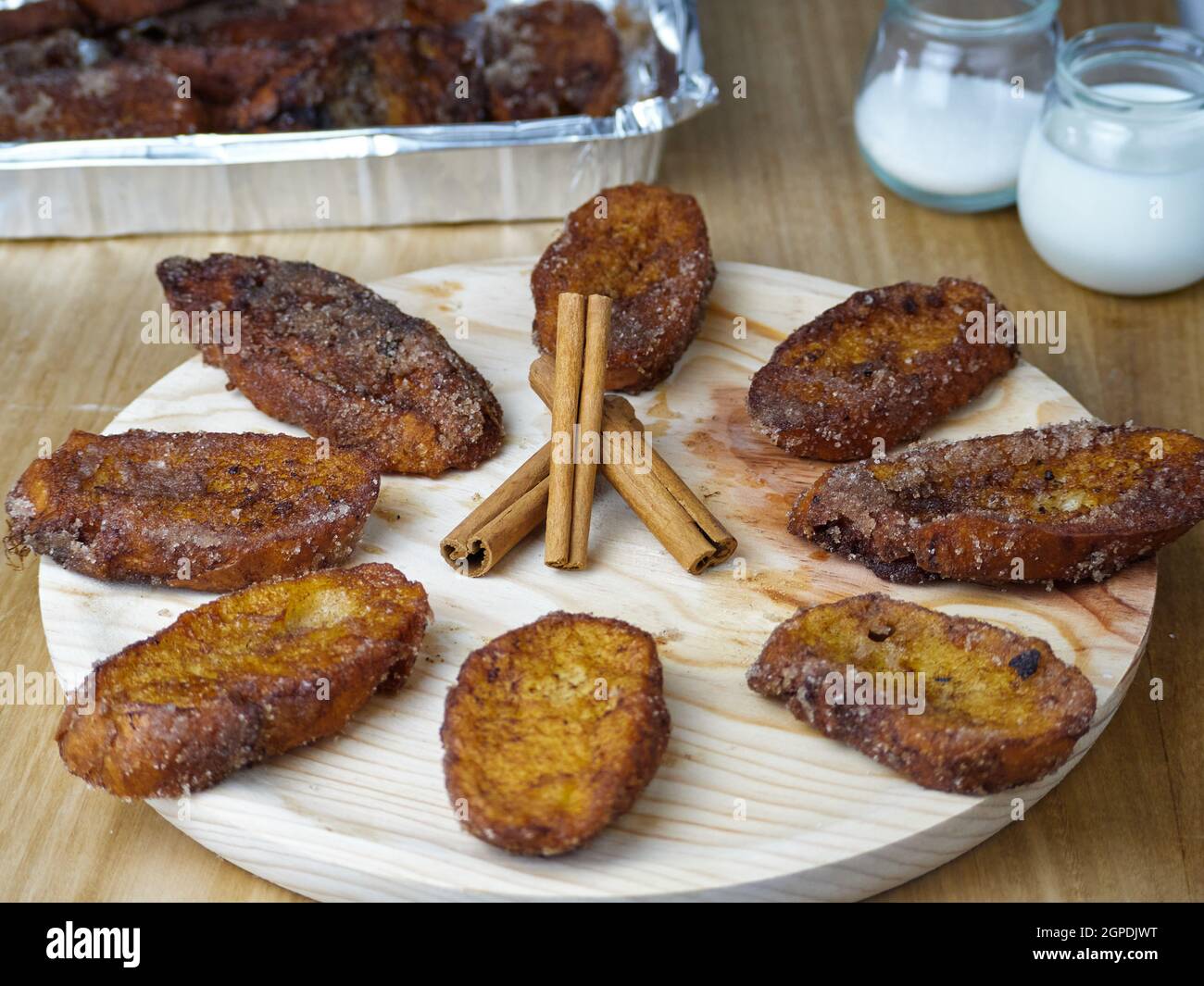 Traditional homemade Spanish Torrijas making a circle and three ...