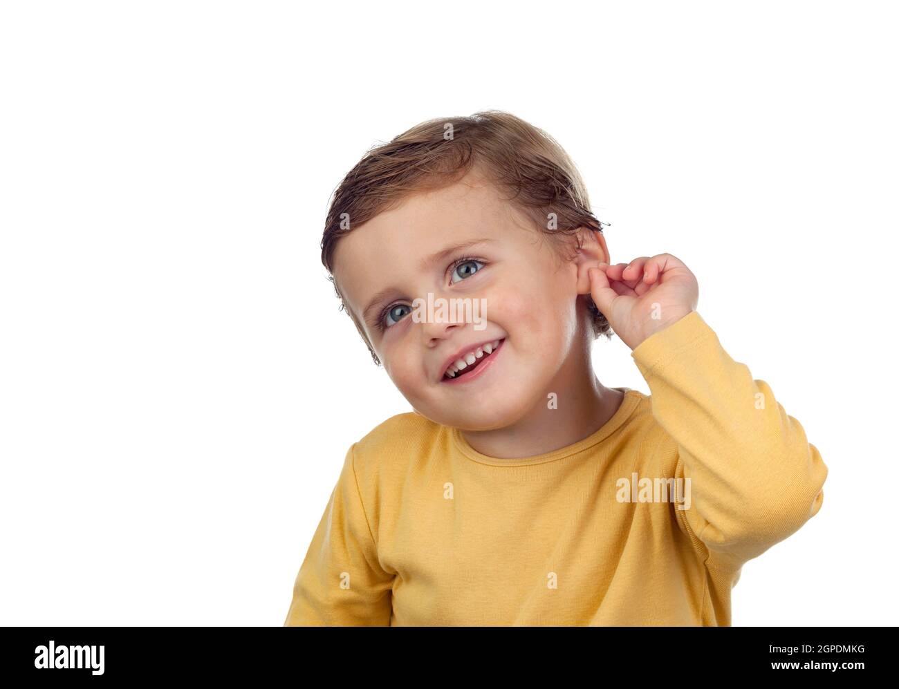 Adorable small child two years old touching his ear isolated on a white ...