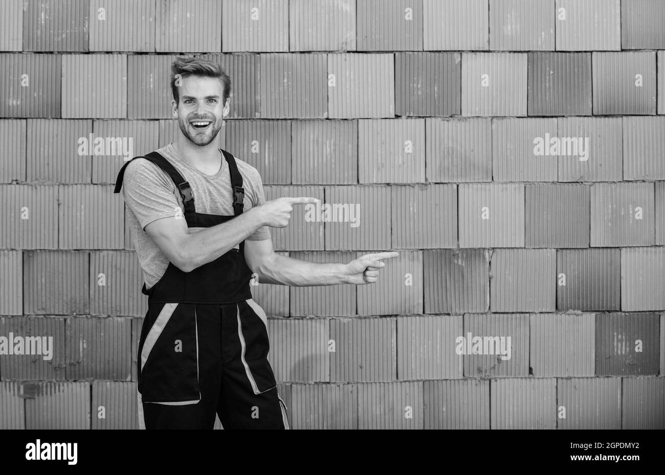 Worker brick wall background. Building construction. Man build house ...