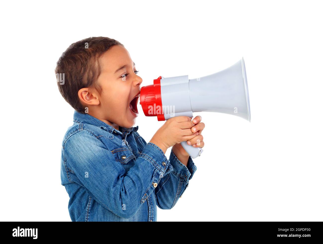 Small boy shouting through a megaphone isolated on white background ...