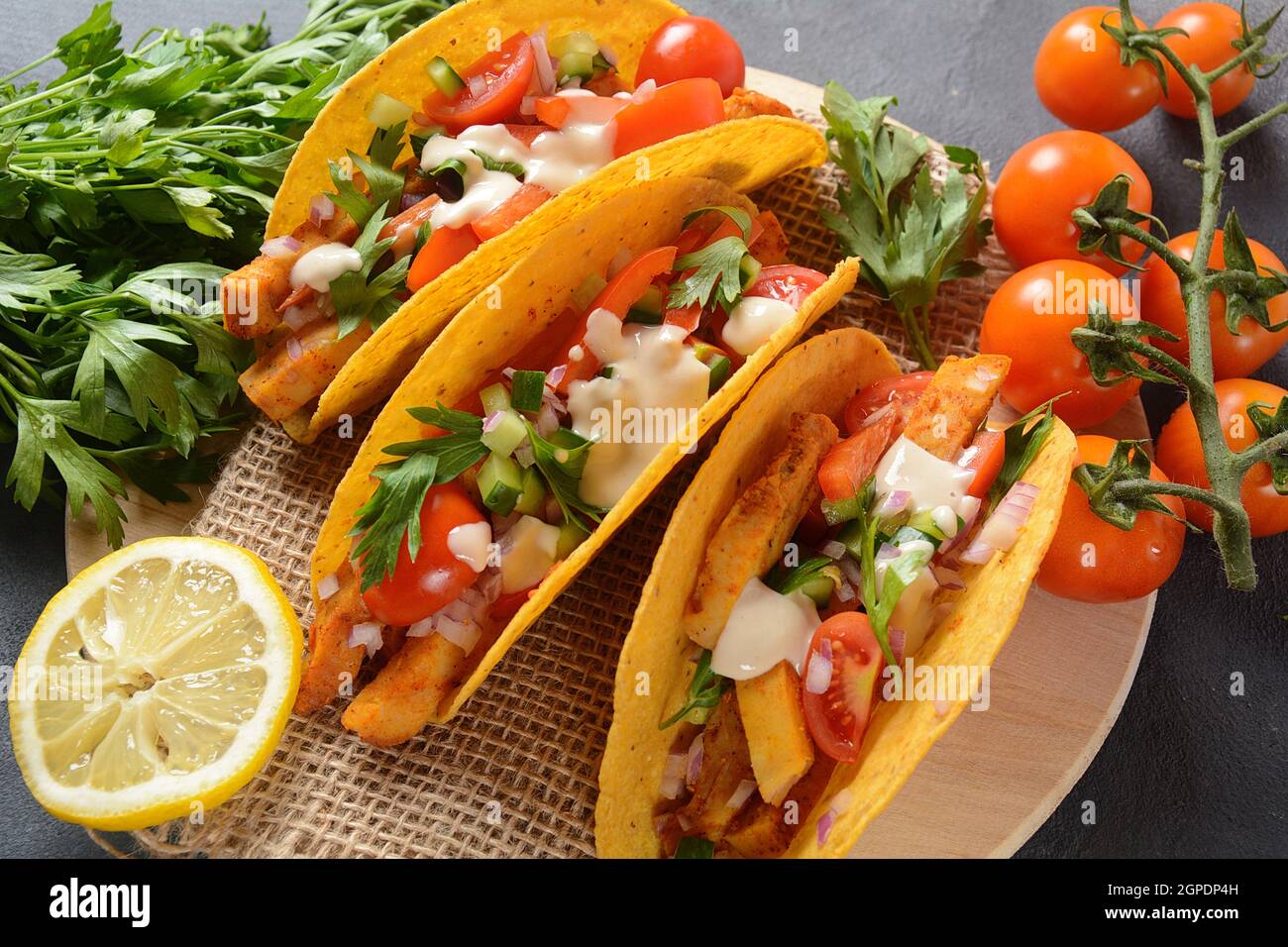 Tacos with grilled chicken and vegetables - Mexican food style Stock ...
