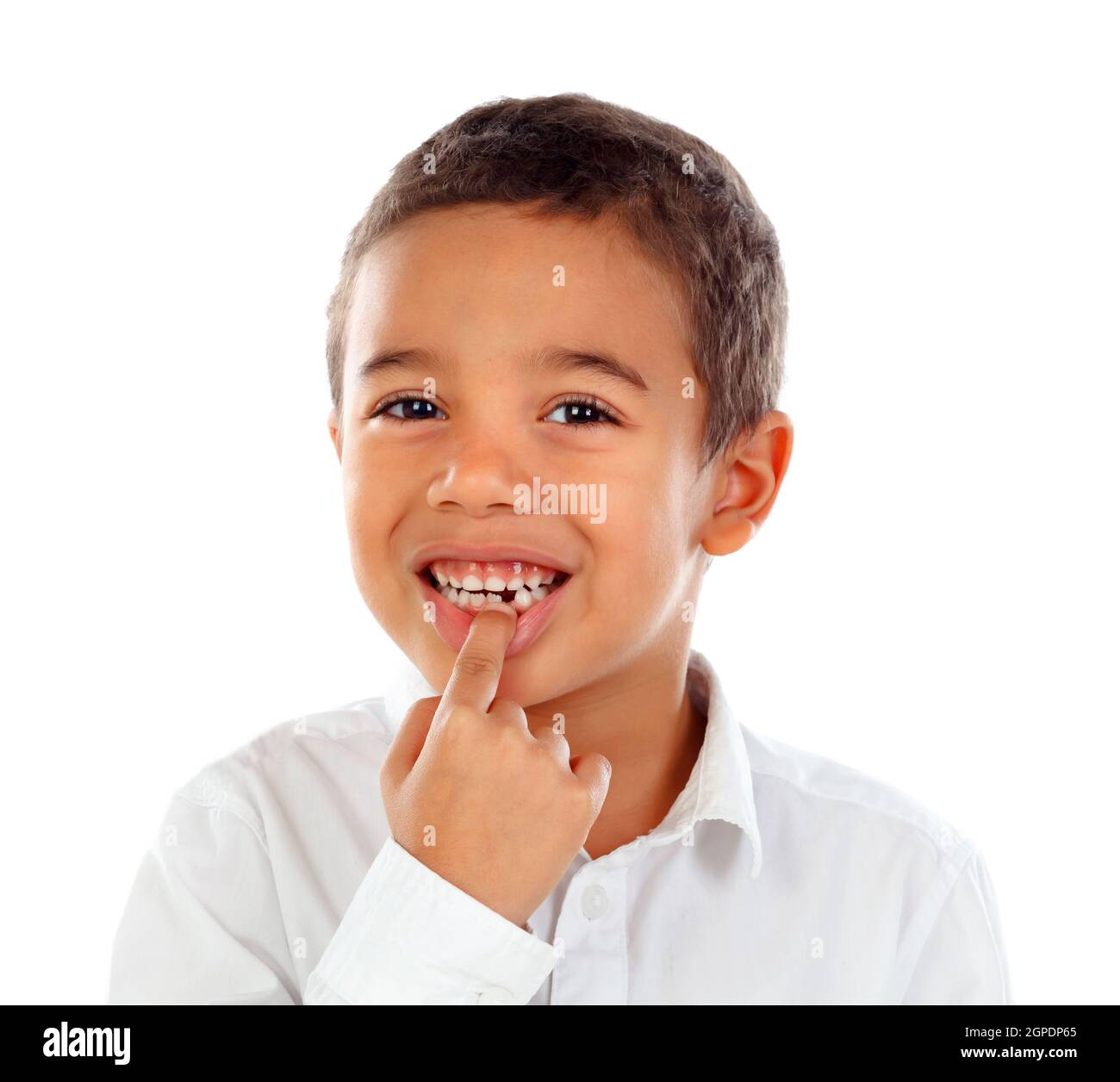 Latin child showing his new teeth isolated on a white background Stock ...